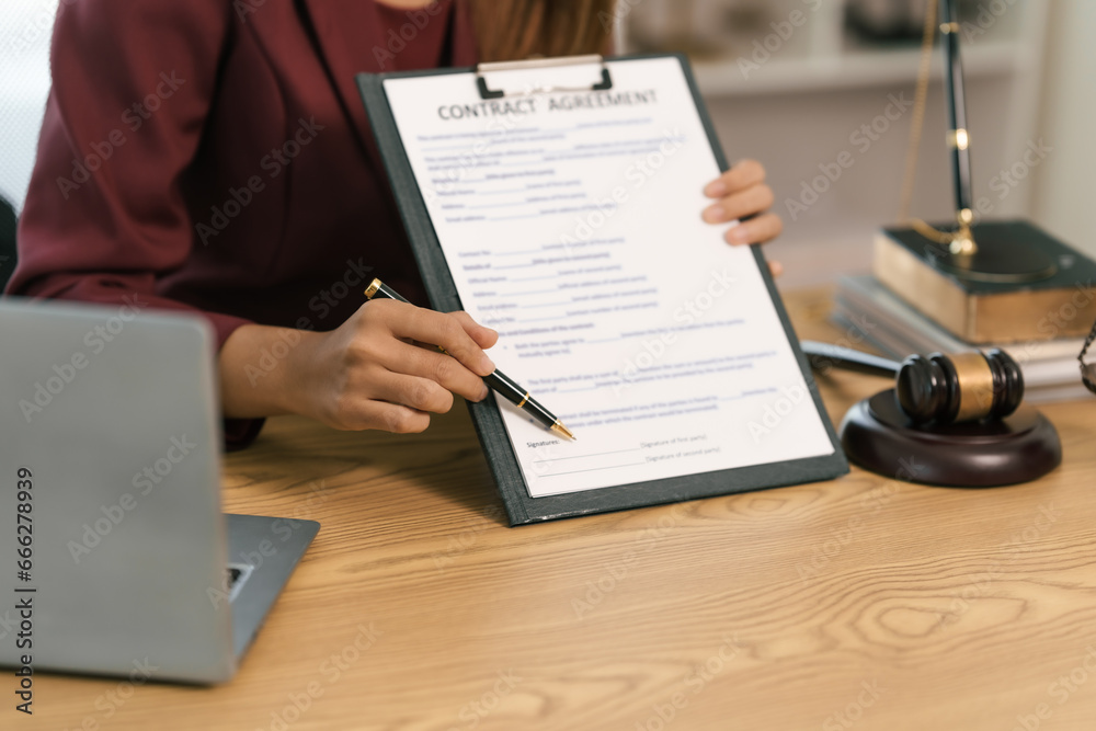 Young Asian female lawyer people reviewing legal documents at desk ...
