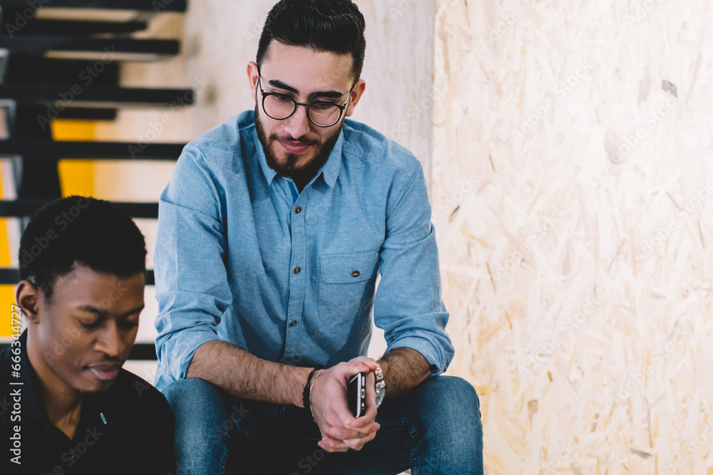 Diversity men using modern laptop device for messaging with friend ...