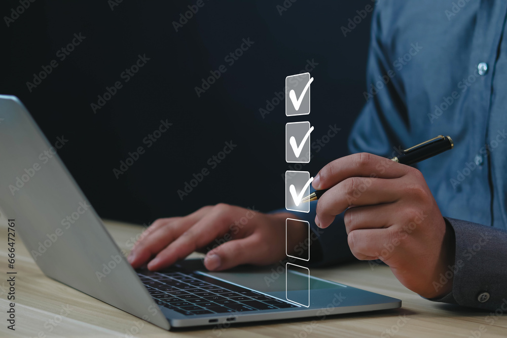 Businessman showing check mark summarizing job Compile lists, votes ...