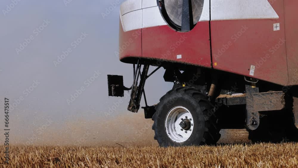 Straw shredder in super slow motion. Straw tailings dusts departing ...