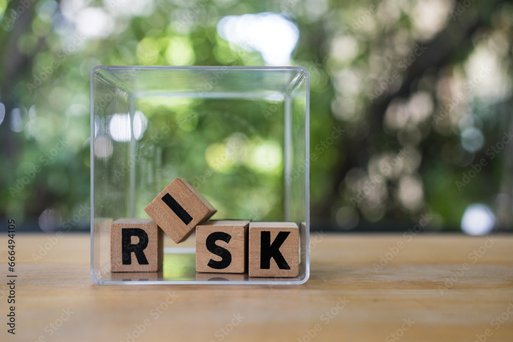 Wooden cubes with risk words in the box. Risk management concept. Four ...