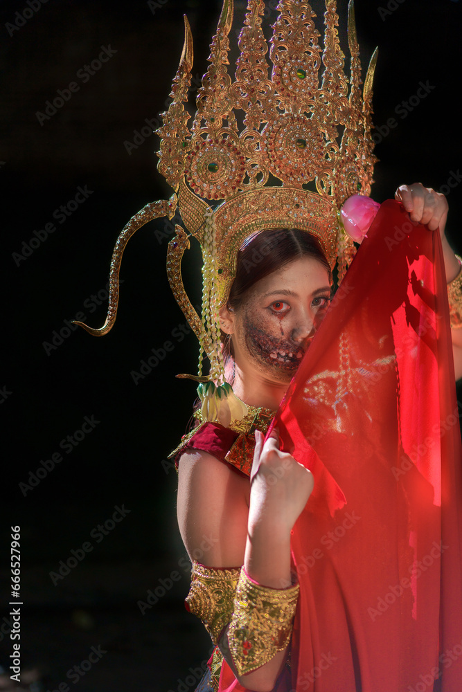 Halloween a scared horrible pretty Asian woman wearing an ancient ...