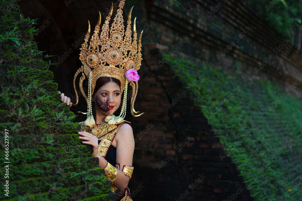 Halloween a scared horrible pretty Asian woman wearing an ancient ...