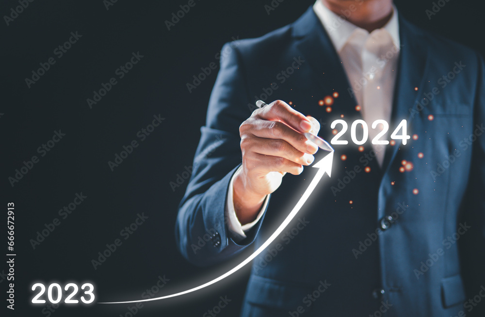 2024 Business Growth Concept. Businessman drawing graph chart showing ...