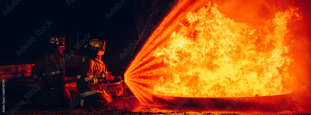 Fearless Firefighters Battling Blaze with Water and Extinguishers ...