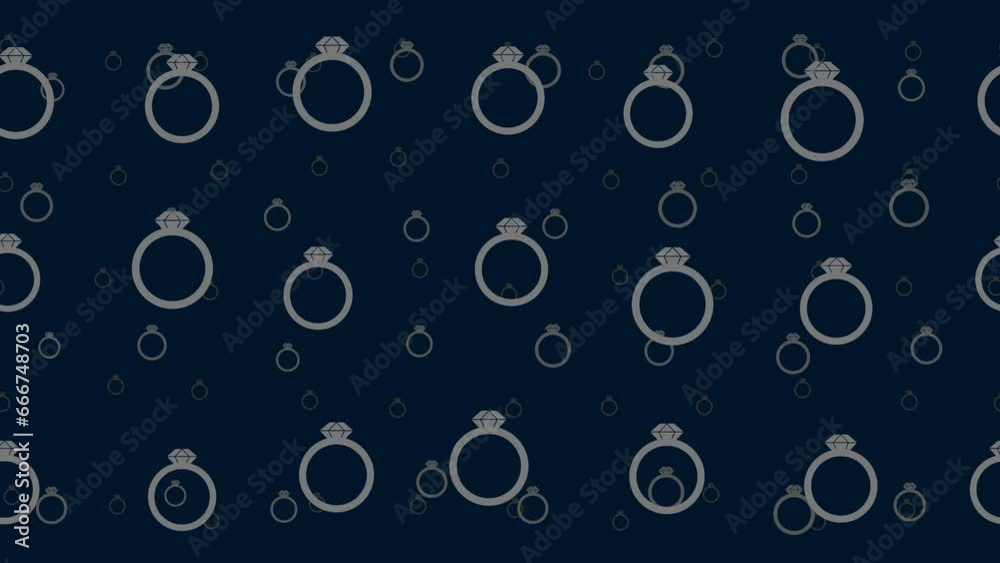 Diamond ring symbols float horizontally from left to right. Parallax ...