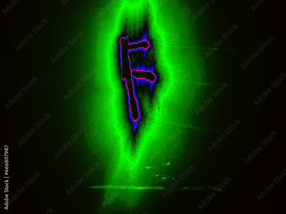 Glowing English letter F. A letter of the English alphabet is ...