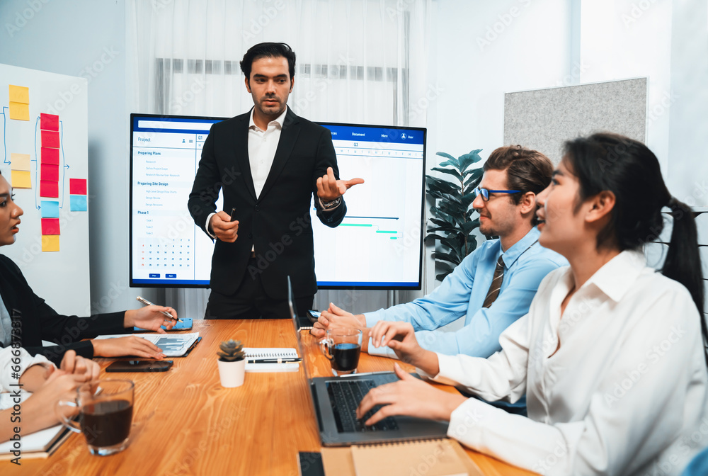 Project manager planning schedules for business task at meeting room ...