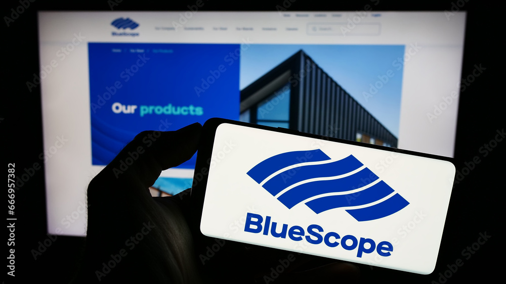 Stuttgart, Germany - 10-16-2023: Person holding mobile phone with logo ...