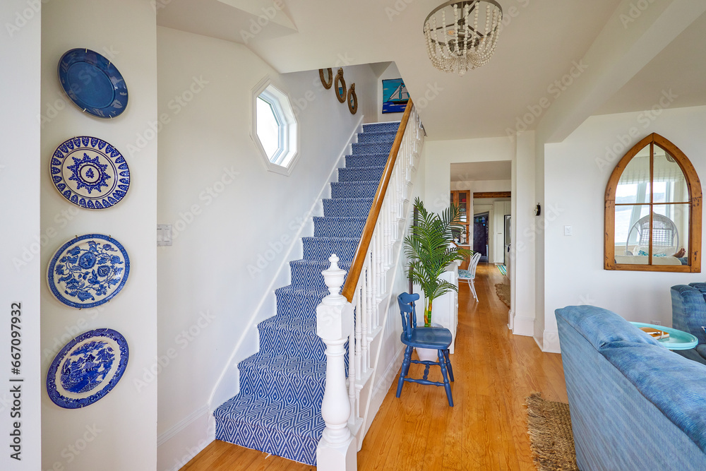 Blue staircase with white bannister in a historic home in Lunenberg ...