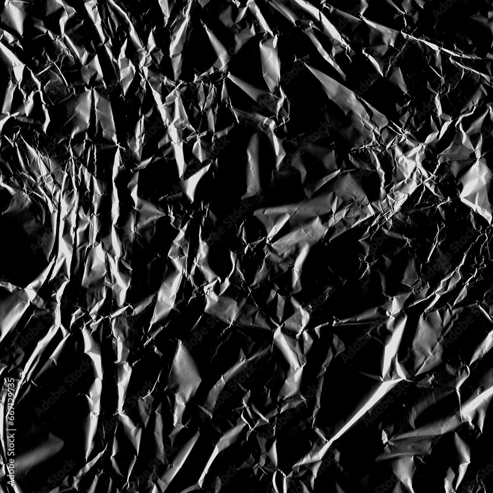 Wrinkled plastic wrap texture on a black background wallpaper. Royalty ...
