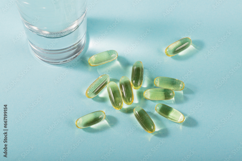 Diet, nutrition, healthy eating concept. Oil filled capsules of food ...