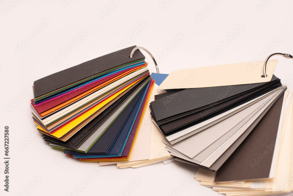 Samples of designer colored paper of different texture and thickness ...