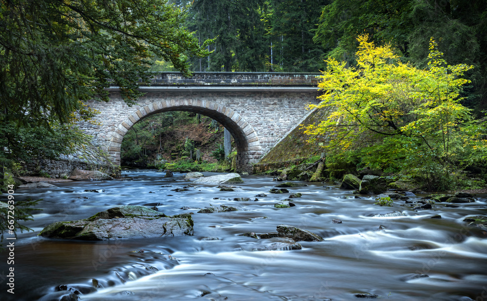 Bridge gate Zemska brana, river Divoka Orlice, Czech republic. Built ...