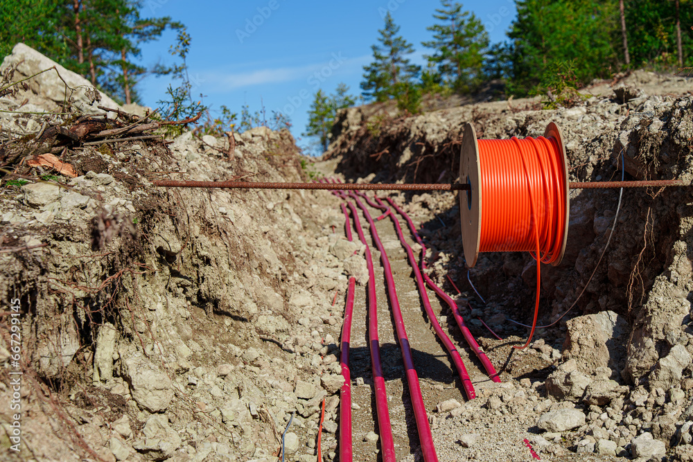 Laying High-Voltage Cables Underground Through the Forest to Connect ...