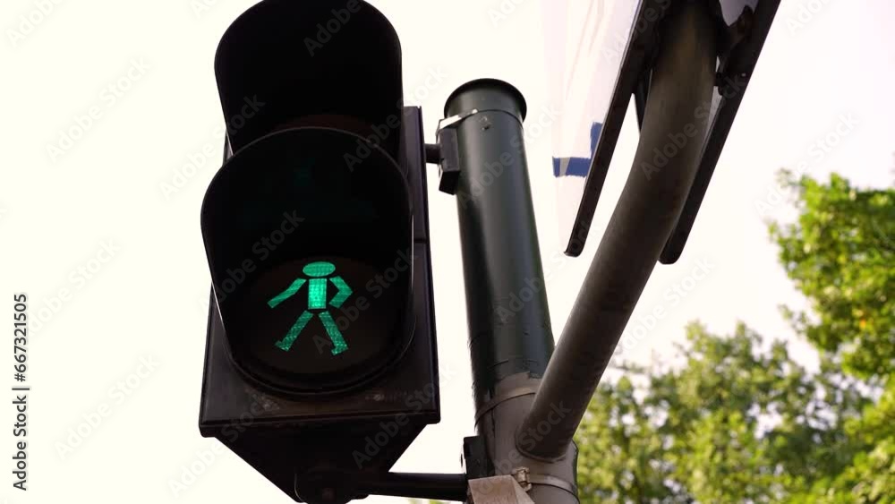Close-up of traffic light at intersection of large city,regulating ...