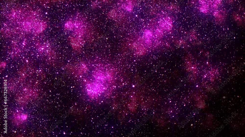 An enchanting purple nebula adorned with sparkling stars is captured in ...
