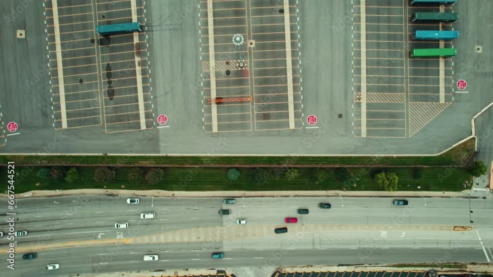 revealing a container trailer parking lot, showcasing a dense ...