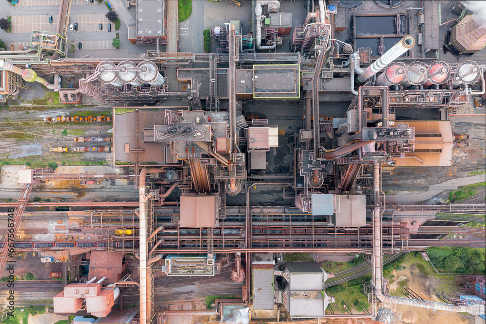 Steel factory from above. Overhead view of a vibrant steel production ...