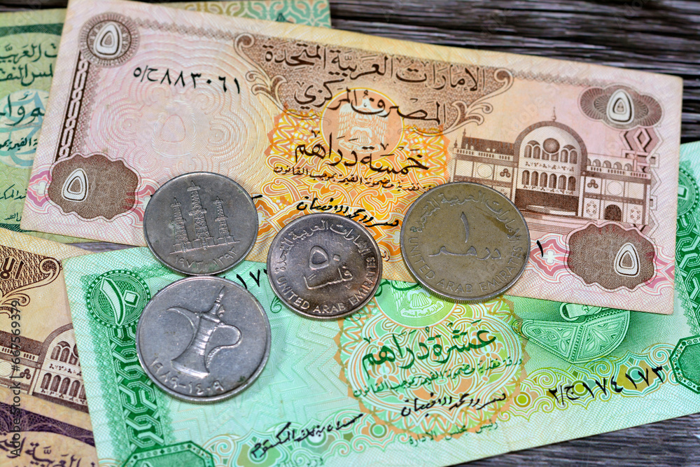 United Arab of Emirates money background of old coins and banknotes of ...