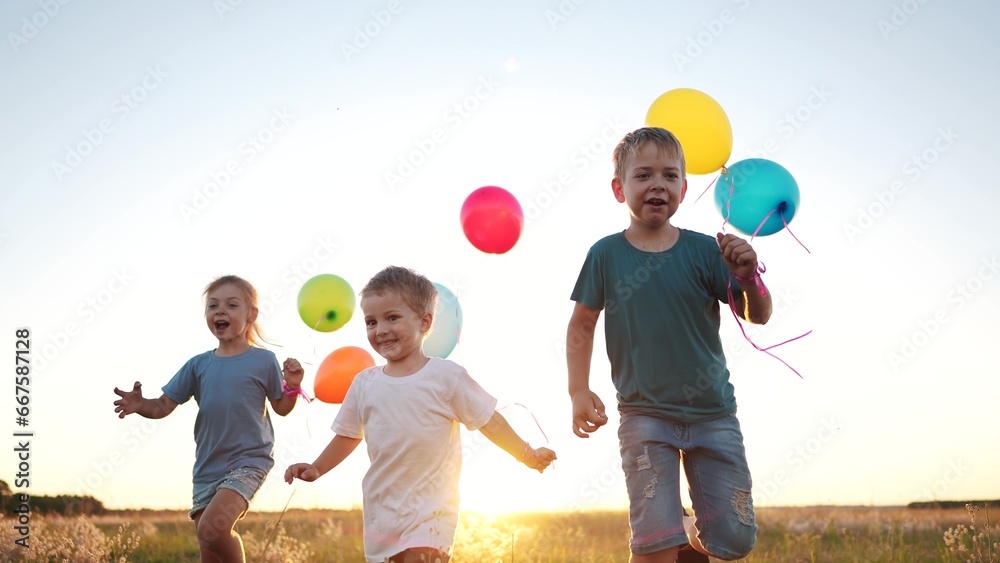 children run across the field. happy family kid dream concept. a group ...