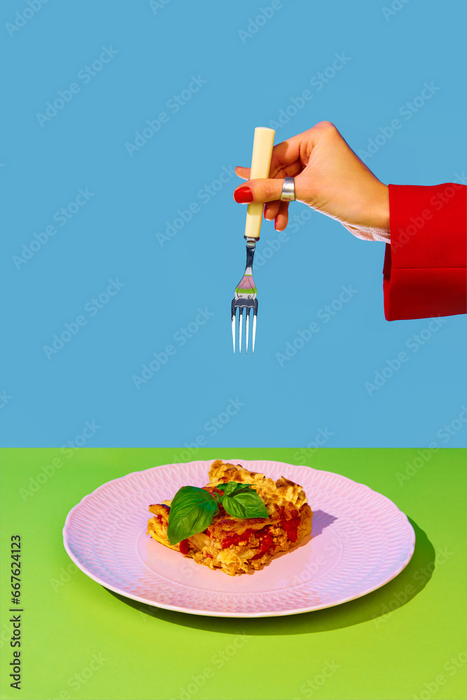 Female hand holding fork over delicious Italian food, lasagna over ...