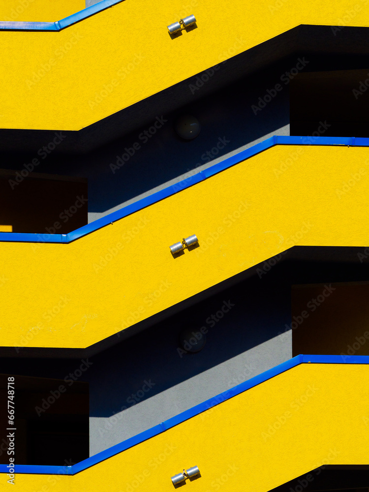 Repeating pattern in street architecture. Abstract background. Yellow ...