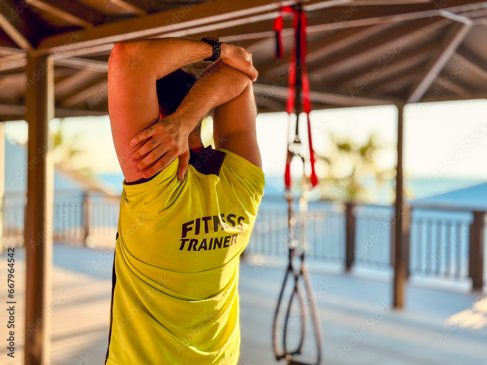 Fitness, bodybuilder man stretching at gym for training, exercise and ...