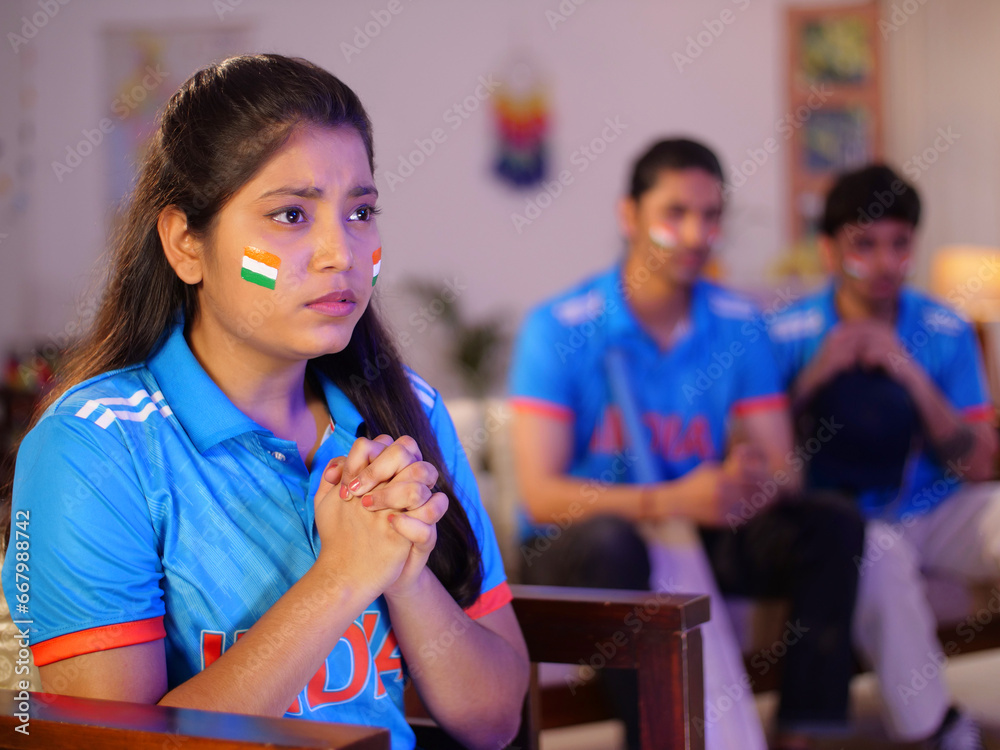 Cricket fans watching a live match at home - Praying for the victory of ...