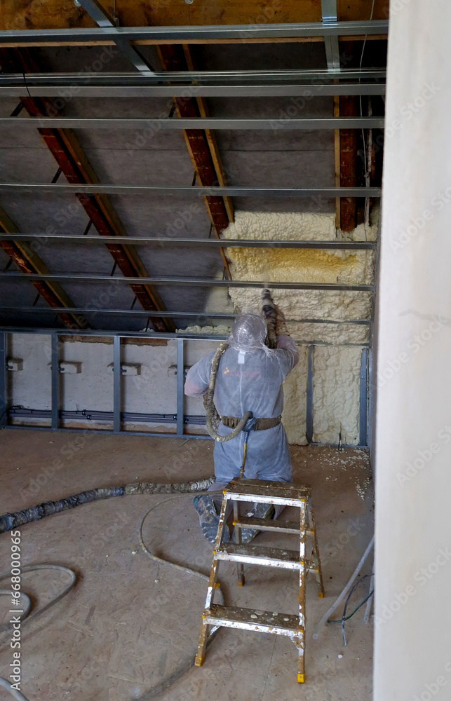 installation of polyurethane foam insulation with compressed gas goes ...