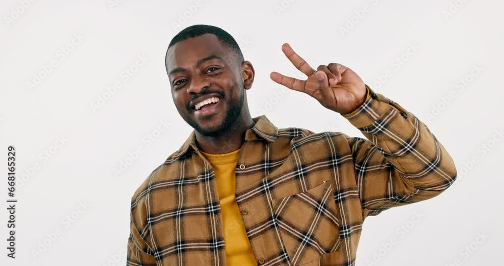 Peace, face and man in studio with smile for winning, vote and good ...