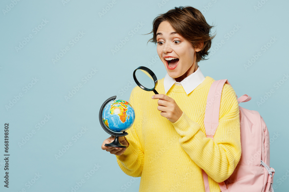 Young surprised woman student wear casual clothes yellow sweater ...