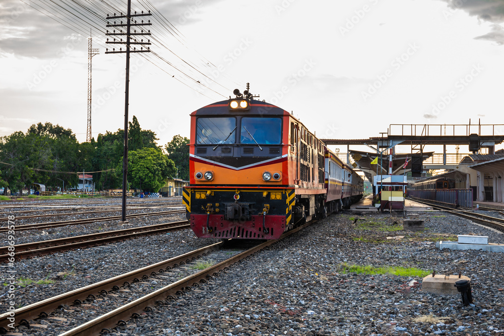 Classic diesel trains transport passengers and tourists in Thailand at ...