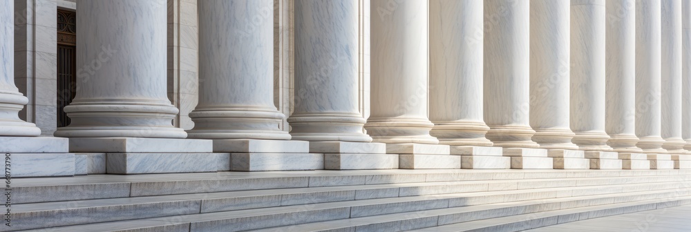 Stone columns colonnade and marble stairs detail. Classical pillars row ...