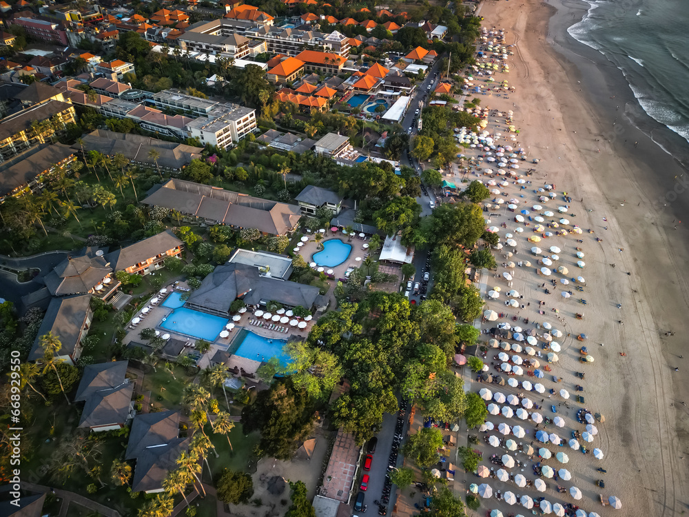 Aerial view of luxury hotel or resort buildings at beach with swimming ...