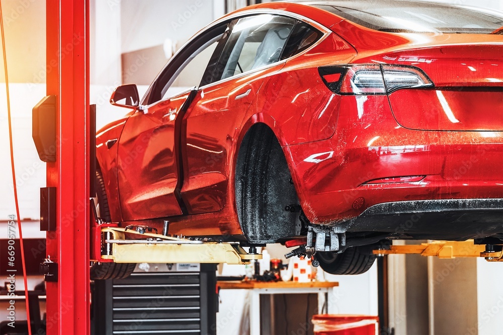 Electric Vehicle Care in a Modern Auto Service. Electric vehicle ...