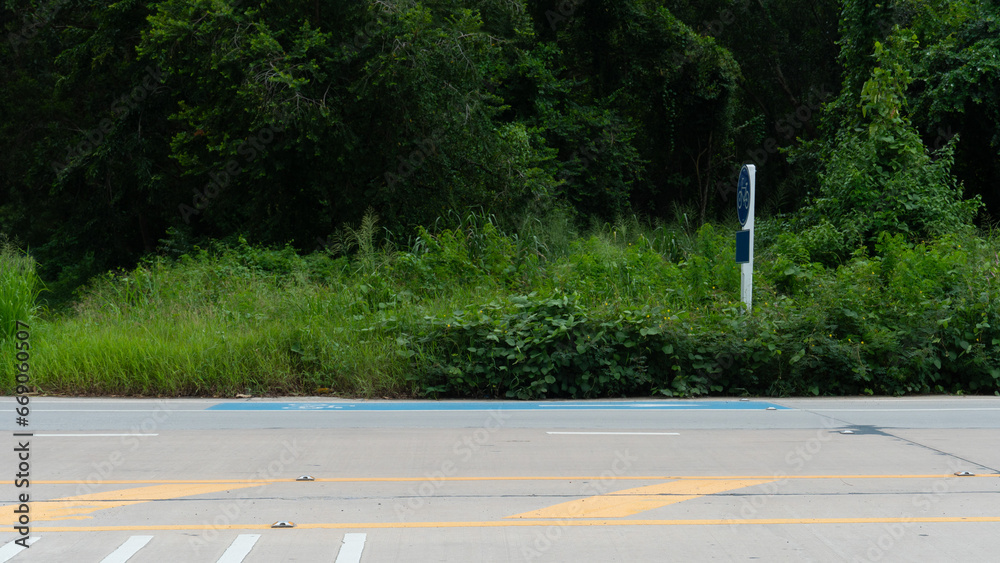 Horizontal view of an asphalt road with bike lens blue color in ...
