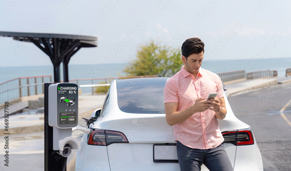 Holiday road trip vacation traveling by the seashore road with electric ...