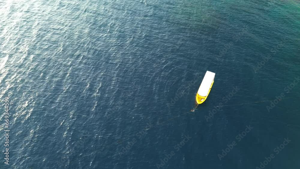 Aerial view of fishing boat in the sea Stock Video | Adobe Stock