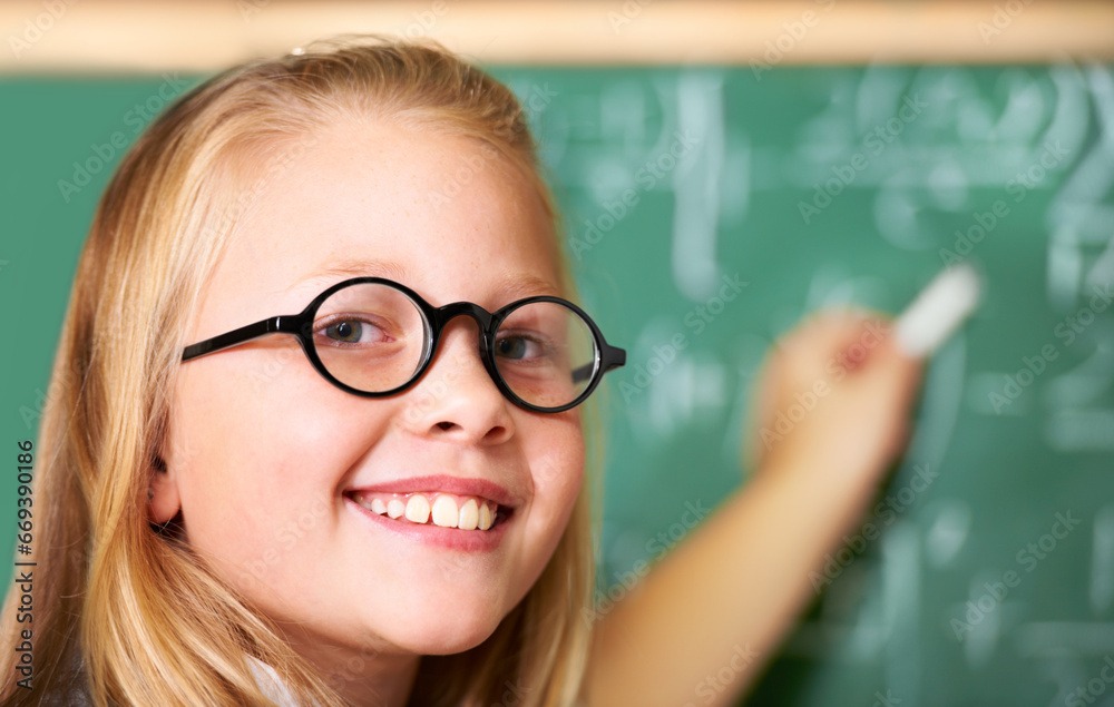 Portrait, nerd and happy kid writing on chalkboard in class for ...
