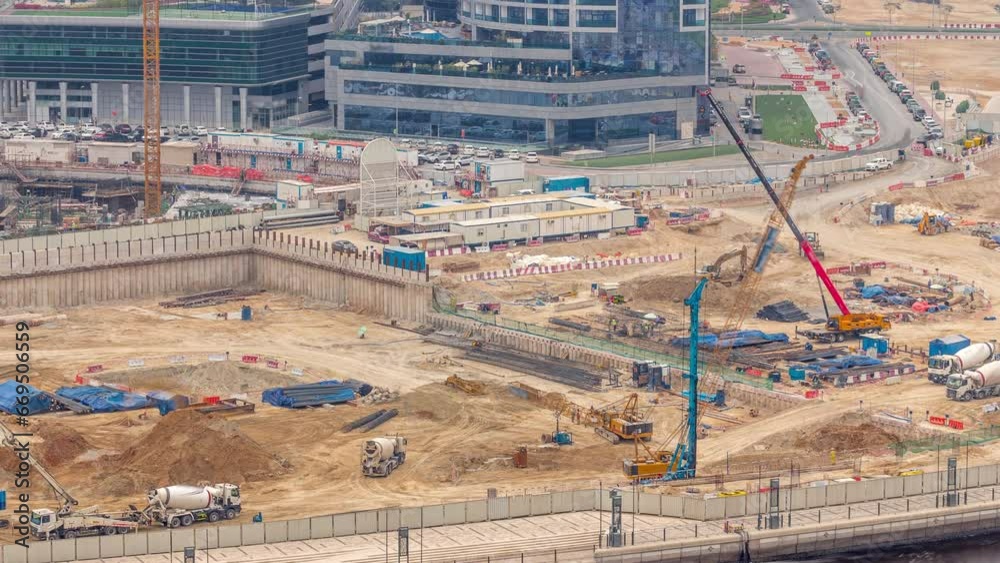 Foundation pit for construction of apartment complex building aerial ...