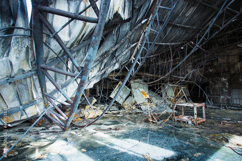 Burnt interiors of ruined factory building after fire, Misfortune in ...