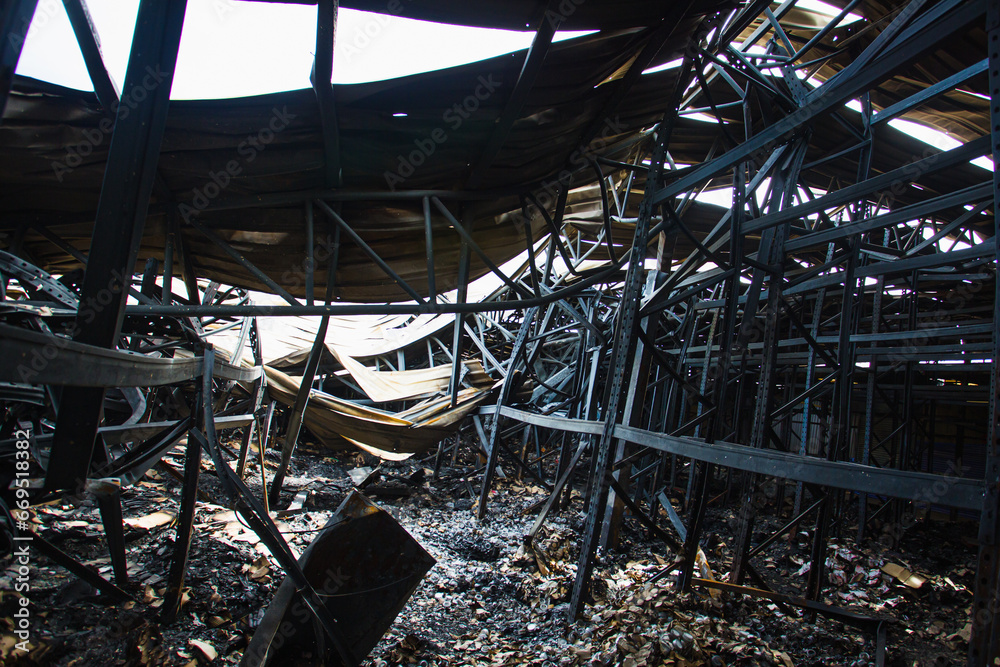 Burnt interiors of ruined factory building after fire, Misfortune in ...