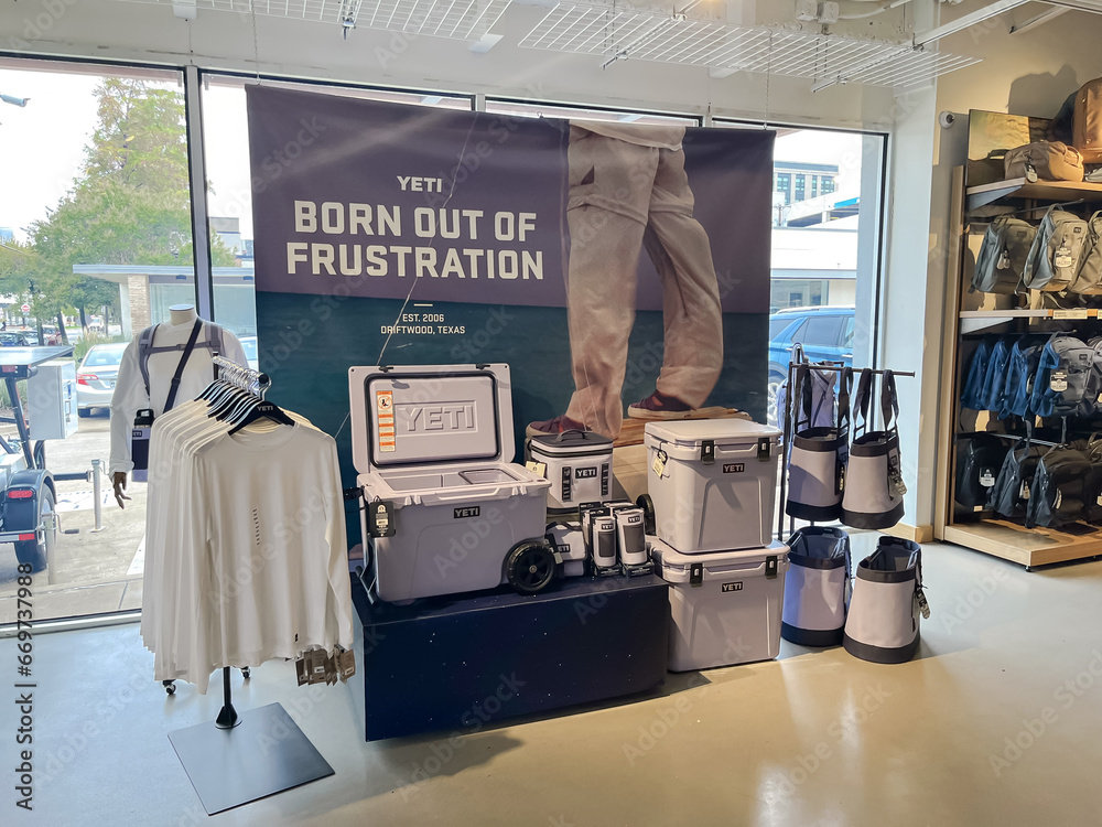 Hiking camping bags and apparel on shelf display at Yeti retail store ...