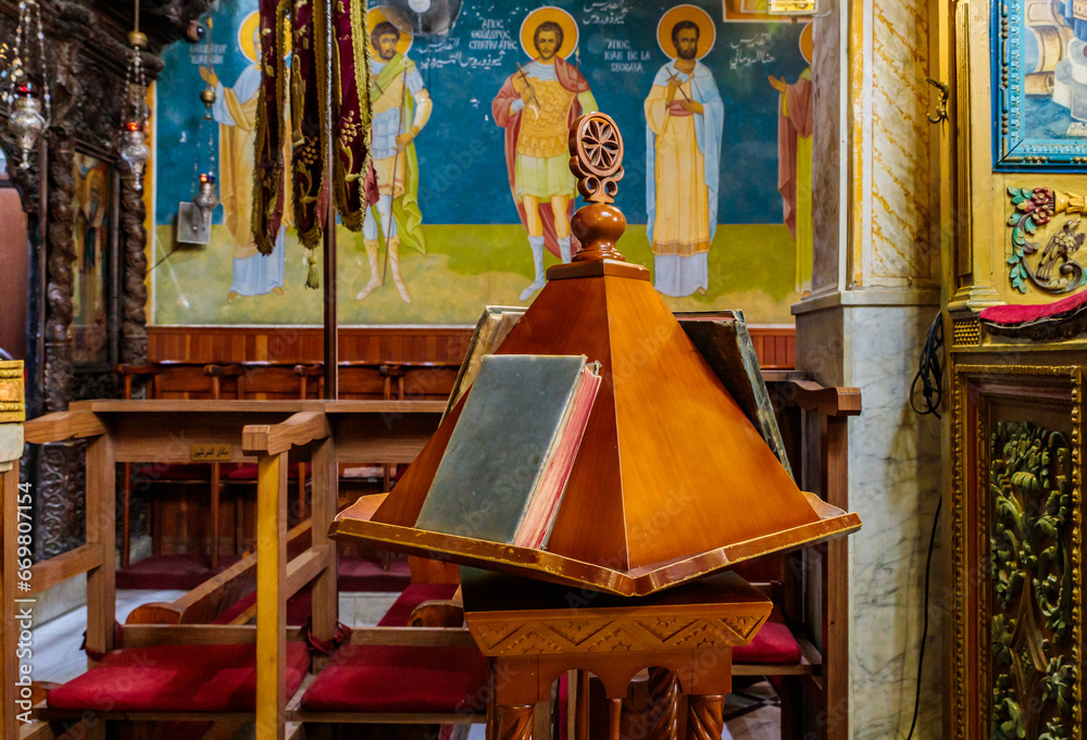 Stand with holy book in the main hall of the Greek Orthodox Church of ...