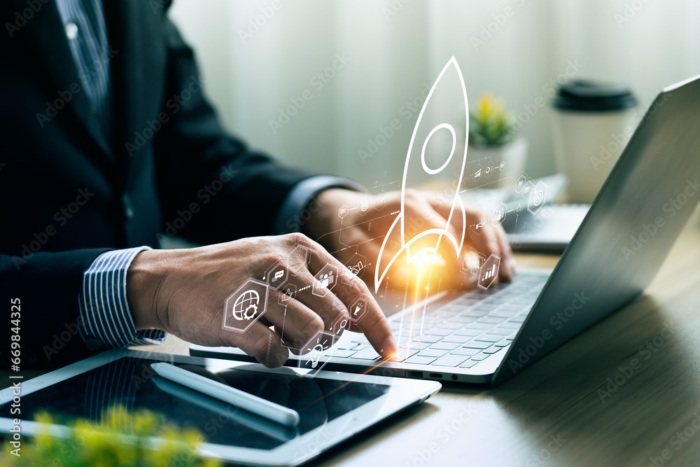 Startup business concept, rocket is launching and flying from hand to ...