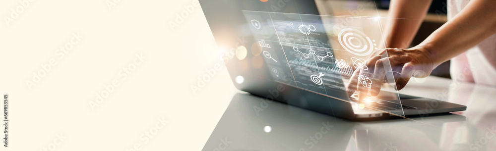 Data scientists. Man programmer using laptop analyzing and development at various information on ...