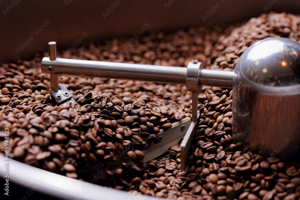 Process roasting coffee beans on professional mixing roaster machines ...