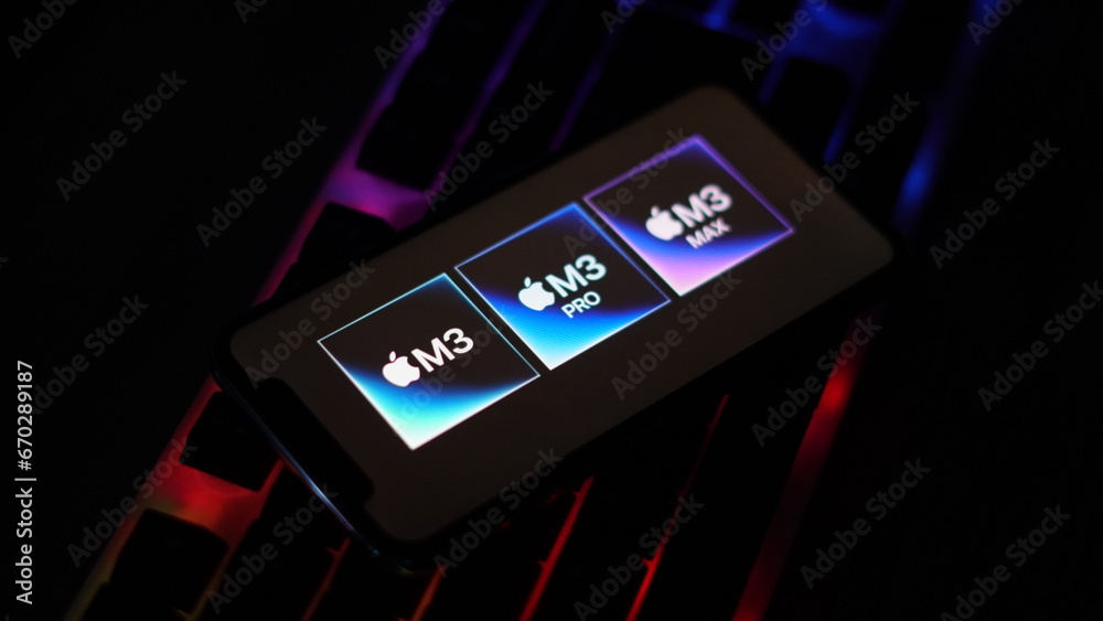 Closeup of smartphone with logo lettering of apple M3, M3 pro, M3 max ...