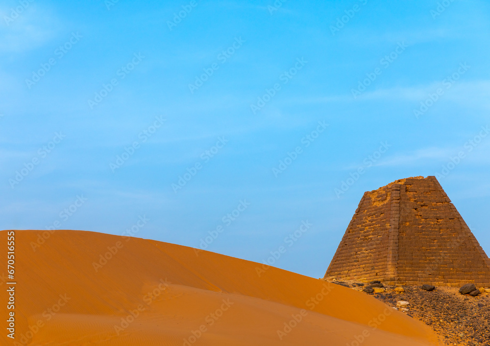 Tourist visiting the pyramids of the kushite rulers at Meroe, Northern ...